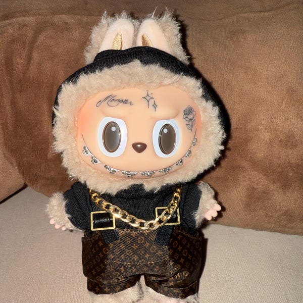 Custom Face-tatted Labubu | Tattoos, Iced-out Grills, Earrings ...