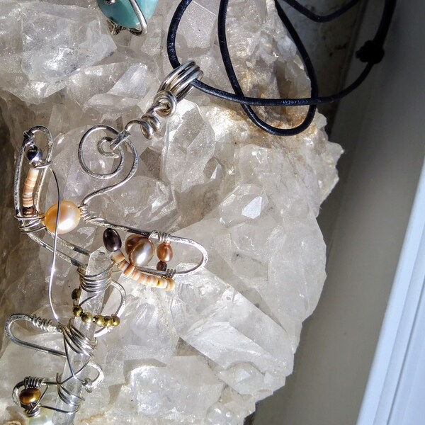 Whirling Waters Spiral Shell Amulet With a Gray Leather Bail - Etsy