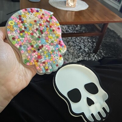 Triceratops Picky Party Pad™ and Tray Satisfy Your Urge to Pick, Pop ...