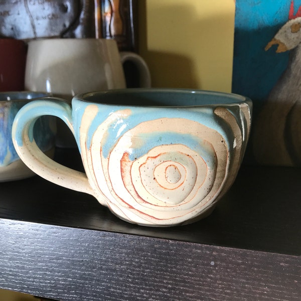 Wheel-thrown Mug With the Carved Abstract Design With a Warm Cream ...