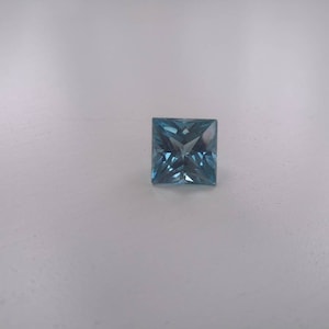 Quality Lab Created London Blue Topaz Triangle Shape 12X12X8.40MM Step ...