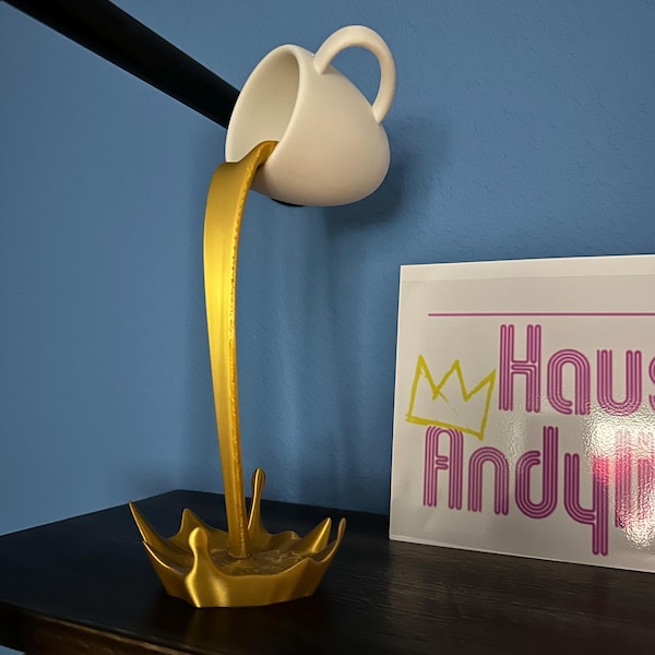 Gravity-defying Liquid Sculpture, Frozen in Time, a Cup Pouring Liquid ...