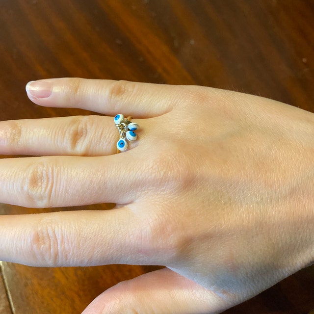 Rbg evil eye ring store