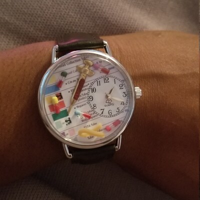 Laboratory Scientist Watch With Vials, Microscope, Beaker, Order of ...