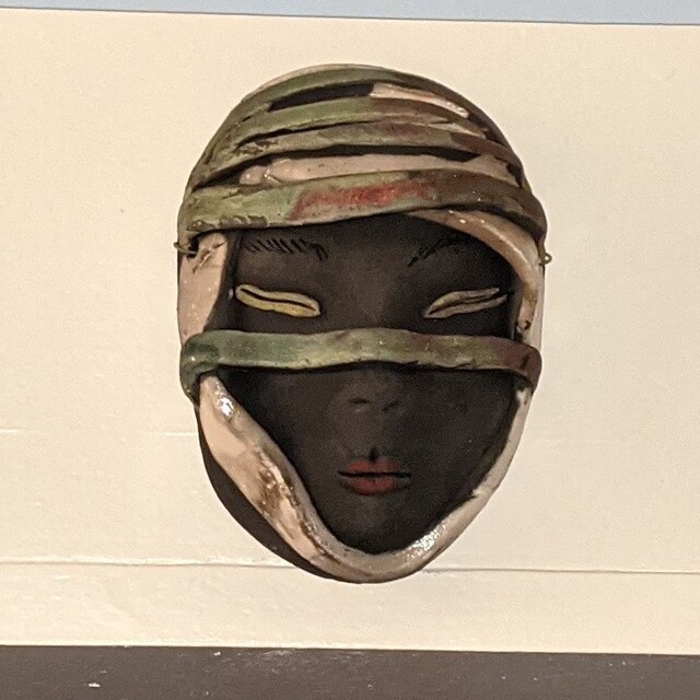 ceramic planters masks pendants illustrated by WickedClayGirl