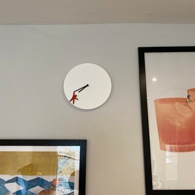 Fuchsia Hanging Man Wall Clock - Etsy