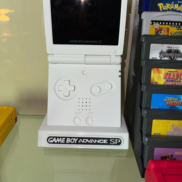 Nintendo Game Boy Advance SP (for Protective Case) and 9 Game Cartridge ...