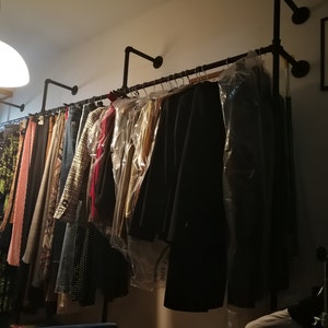 Hanging Coat Rail From Pamo. Designs Black Clothes Rail Made of Steel ...