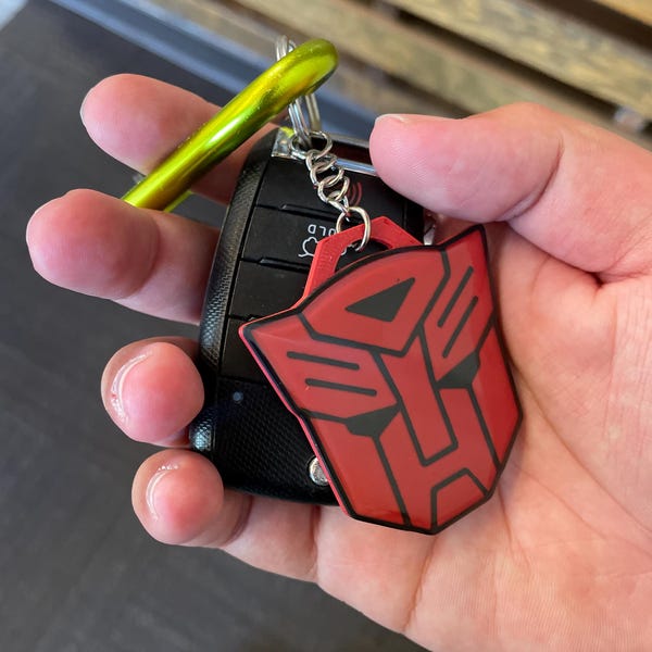 Transformers Autobot Emblem Keychain 80s Cartoon Holiday - Bag Charm ...