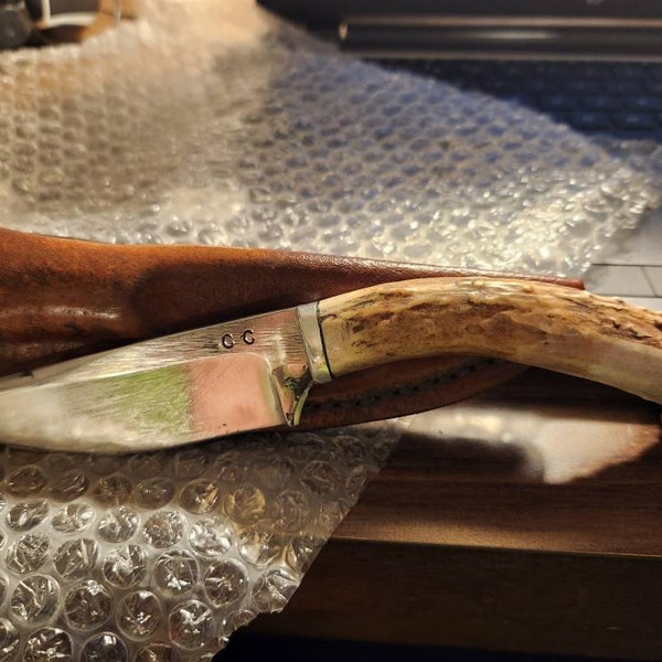 Item #24. Damascus Knife. Brass Guard. Shed Antler Handle. Fringed ...