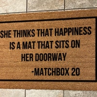 She Thinks That Happiness is a Mat That Sits on Her Doorway, Matchbox ...