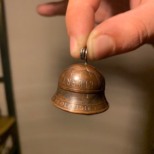 Aztec Gremlin Bell - Etsy