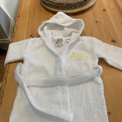 Swimming Logo Embroidered Onto a White Terry Towelling Adult Bath Robe ...