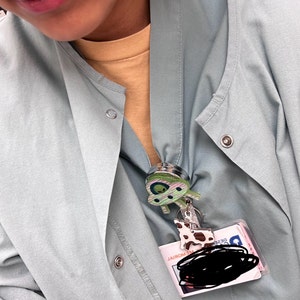 The Original UFO Alien Trex Dinosaur Abduction Retractable Badge Reel ...