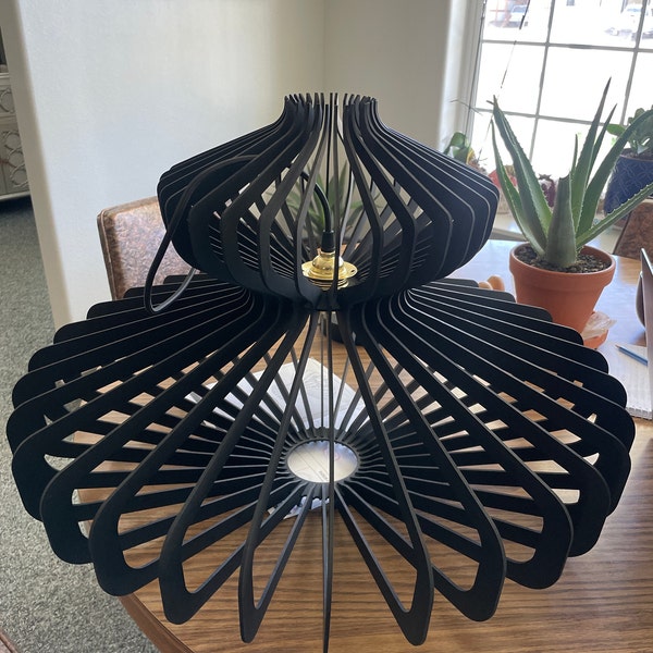 Artisan Hanging Light Fixture in Wood, Providing Ambient Lighting for ...