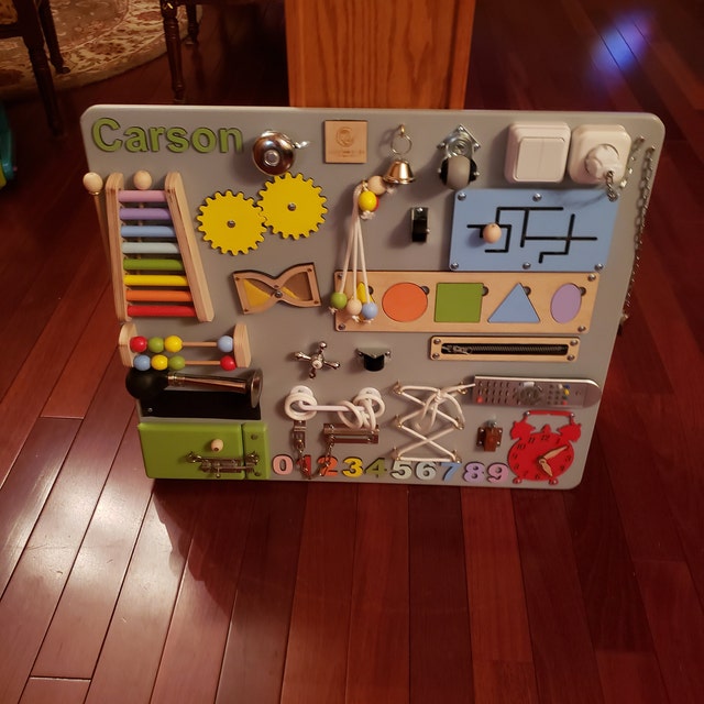 Busy toys for your children from natural wood. by BabyBooBusyBoard