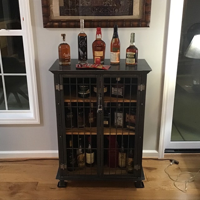 Locked liquor cabinet store