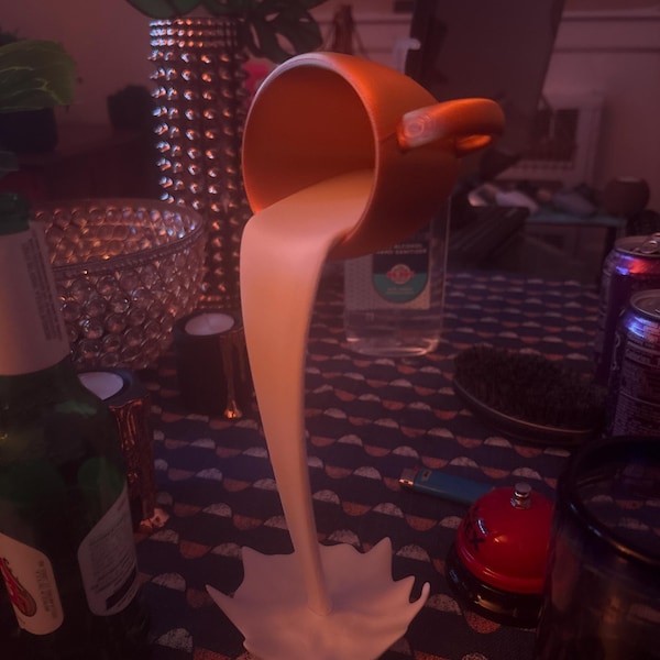 Gravity-defying Liquid Sculpture, Frozen in Time, a Cup Pouring Liquid ...