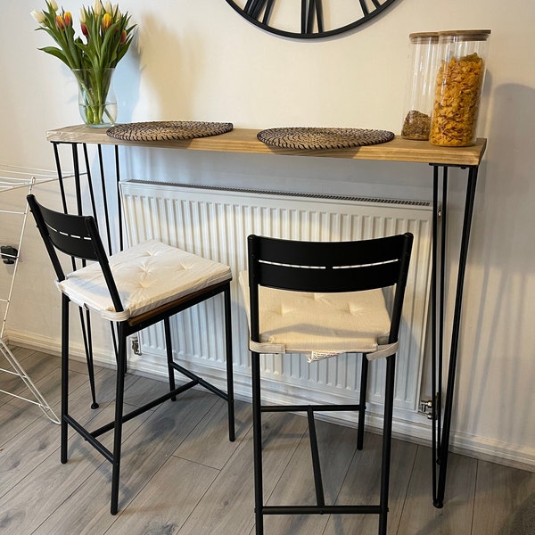 Wooden Breakfast Bar Wall Mounted on Stylish Steel Brackets With a ...