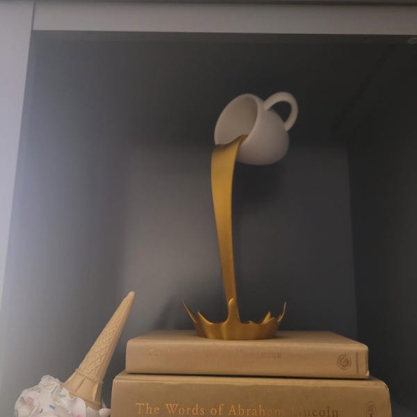 Gravity-defying Liquid Sculpture, Frozen in Time, a Cup Pouring Liquid ...