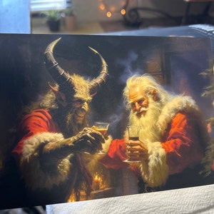Krampus and Santa Claus Celebrating Christmas Toasting Holiday Card ...