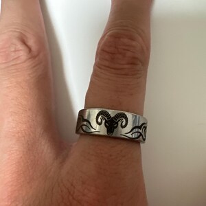 Howling Wolf in Front of Full Moon on a Boulder Rock Forest Tree Scene ...