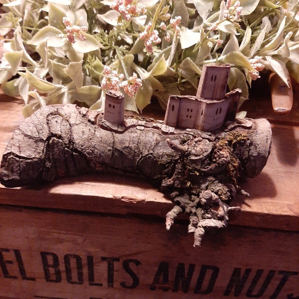 Wooden Pop up Castle Carved From a Garden Tree Log Expending Into a ...