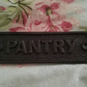 A lovely vintage style cast iron pantry door sign | Etsy