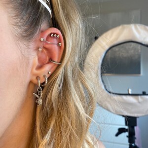 ASTM F136 Titanium Gem and Smooth Crossover Conch Clicker - Etsy