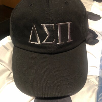 Two Line Greek Letters Dancing Script Baseball Cap Officially Licensed ...