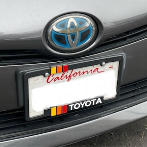 Vintage-toyota-retro-style-license-plate-frame-trd-offroad-tacoma-fj ...