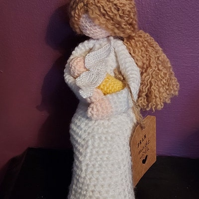 Crochet Pattern little Sparrow Zion Asher. Mother Sitting on a Rock ...