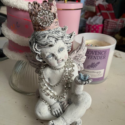 Cherub Holding Bird Crowned Cherub Cherub With Crown Winged Cherub ...