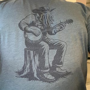 Mothman #31 Wearing Headphones and Eating a Burrito. SVG. White on ...