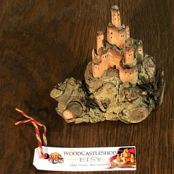 Wooden Pop up Castle Carved From a Garden Tree Log Expending Into a ...