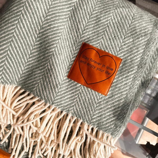 Woollen Throw Personalised With a Message Engraved on a Gold Leather ...