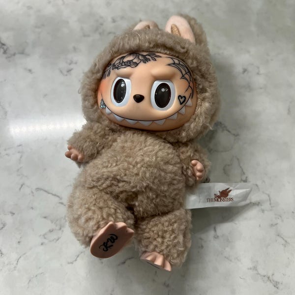 Custom Face-tatted Labubu | Tattoos, Iced-out Grills, Painted Eyes ...