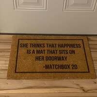 She Thinks That Happiness is a Mat That Sits on Her Doorway, Matchbox ...