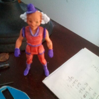 Batcave Trophy Room With Robin Memorial, Giant Penny, Penguin, and ...