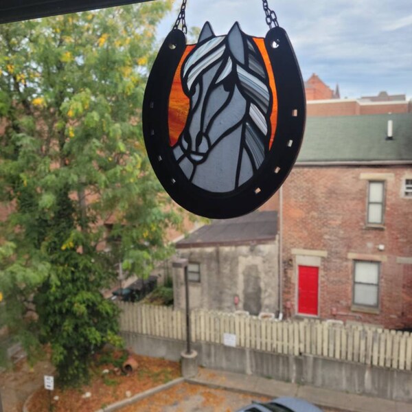 Stained Glass Sitting Cardinal Against Pink and Green Background in ...