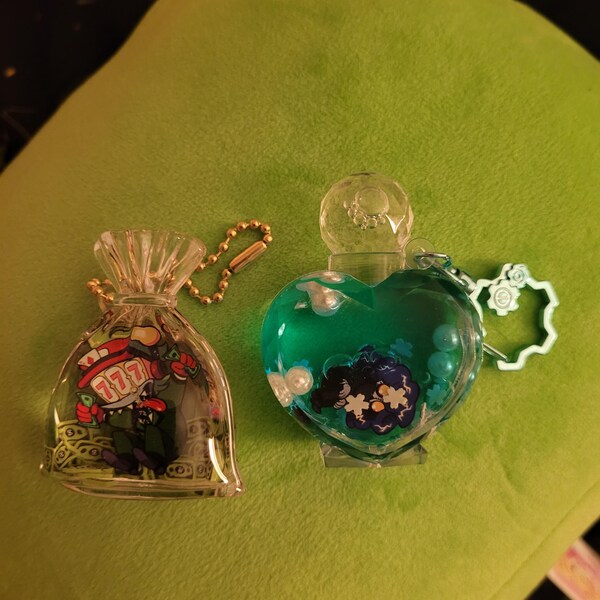 Duck Shuffler Liquid Money Bag Charm - Toontown Corporate Clash ...