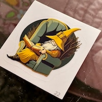 Enchanting Yellow Knight Reading Sticker: Whimsical Artwork for Book ...