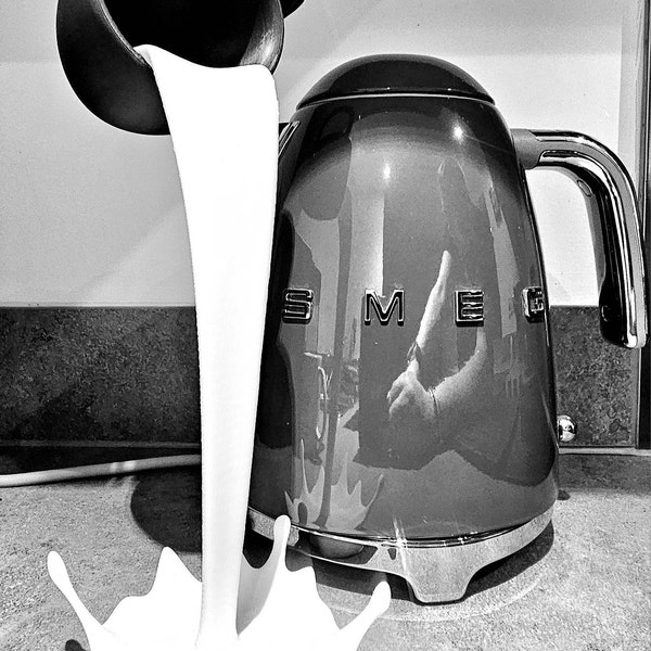 Gravity-defying Liquid Sculpture, Frozen in Time, a Cup Pouring Liquid ...