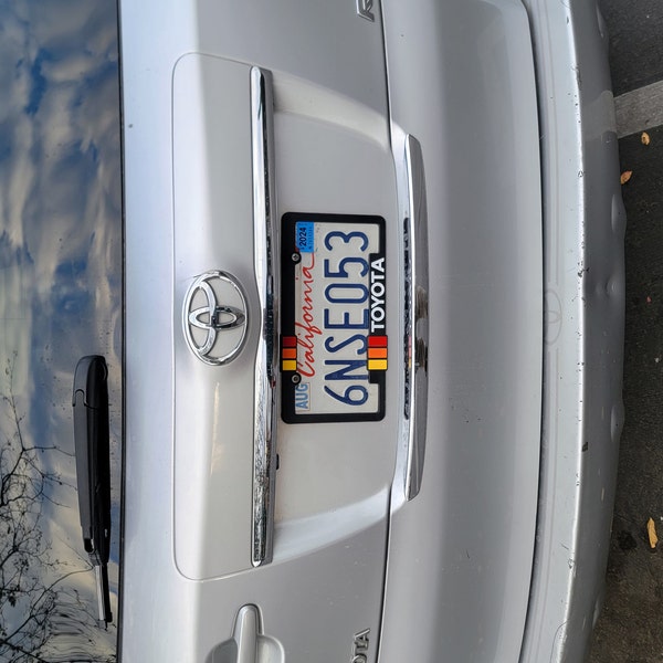 Vintage-toyota-retro-style-license-plate-frame-trd-offroad-tacoma-fj ...