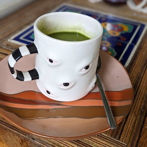 Hand Painted Plain Eyes Striped Handle Clay Coffee Mug, Funky Mug ...