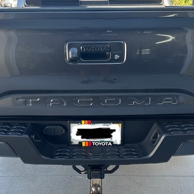 Vintage-toyota-retro-style-license-plate-frame-trd-offroad-tacoma-fj ...