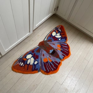 Handmade Tufted Blue Moth Rug - Etsy