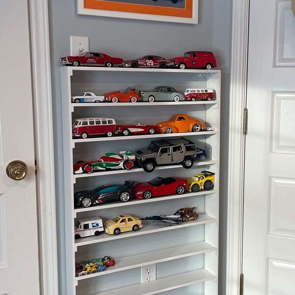 Planes Fire and Rescue, Cars, Monster Trucks, Legos, Wall Display Rack ...