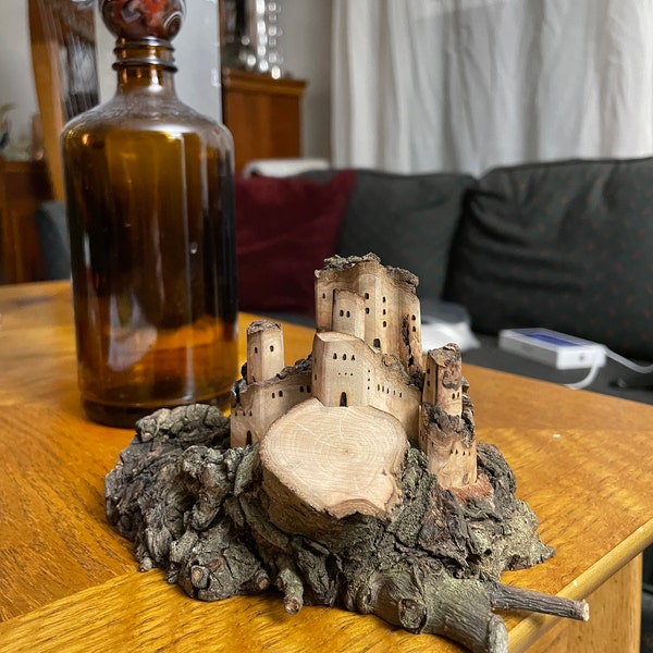 Wooden Pop up Castle Carved From a Garden Tree Log Expending Into a ...