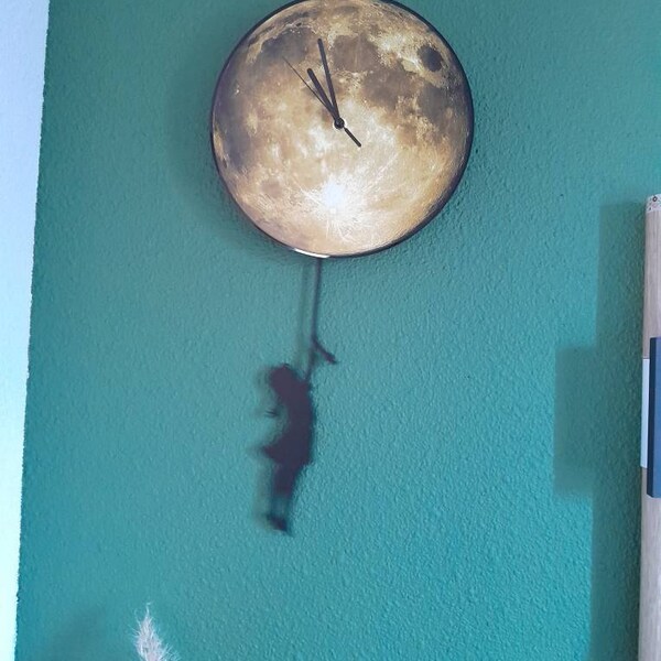 Girl With Braid Swinging on the Moon - Wall Clock With Pendulum - Wall ...